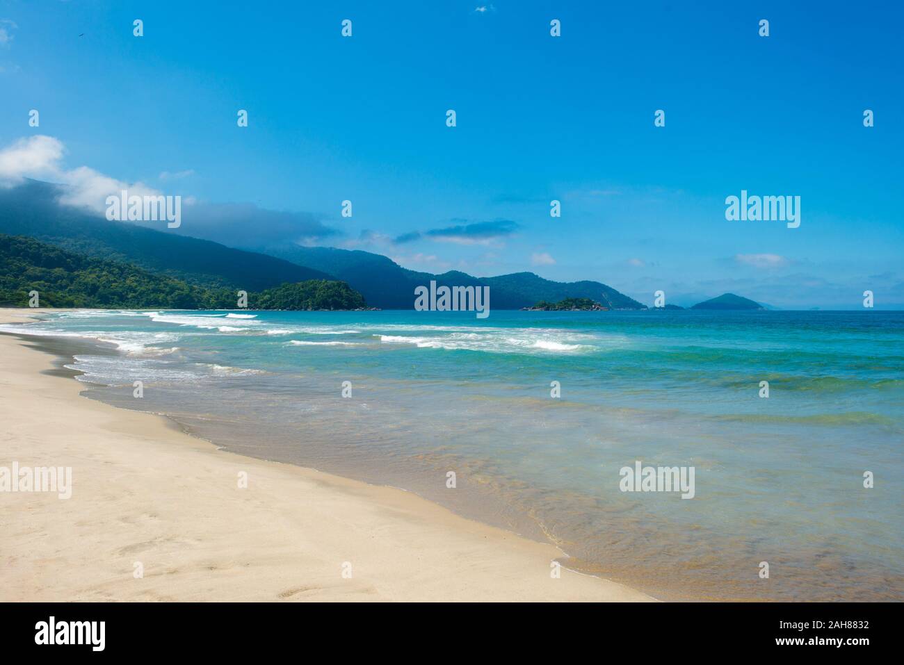 Beautiful beach with mountains on background. Ilhabela island, Brasil ...