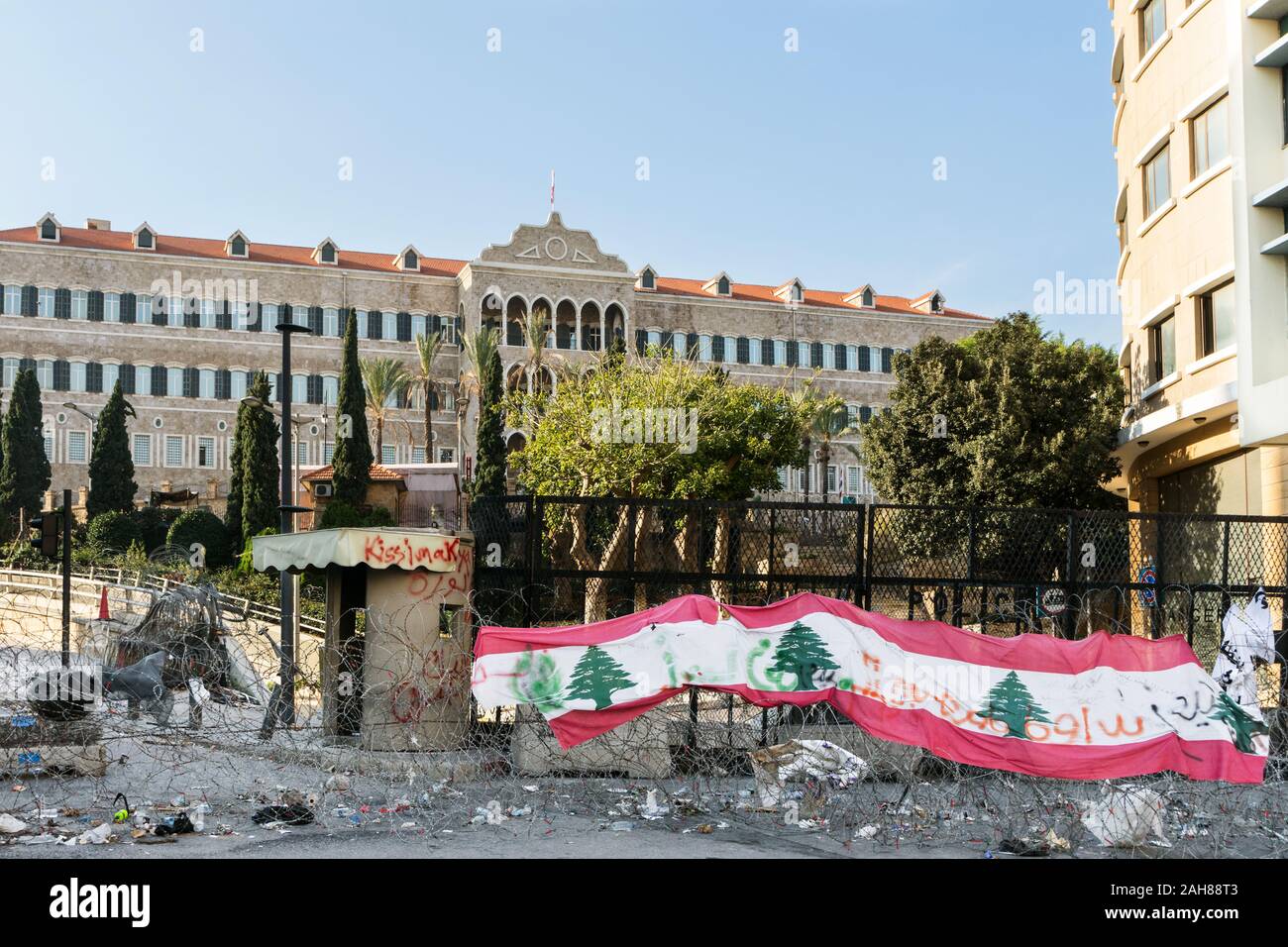 Lebanese flag on barbed wires in front of the Grand Serail during 2019 ...