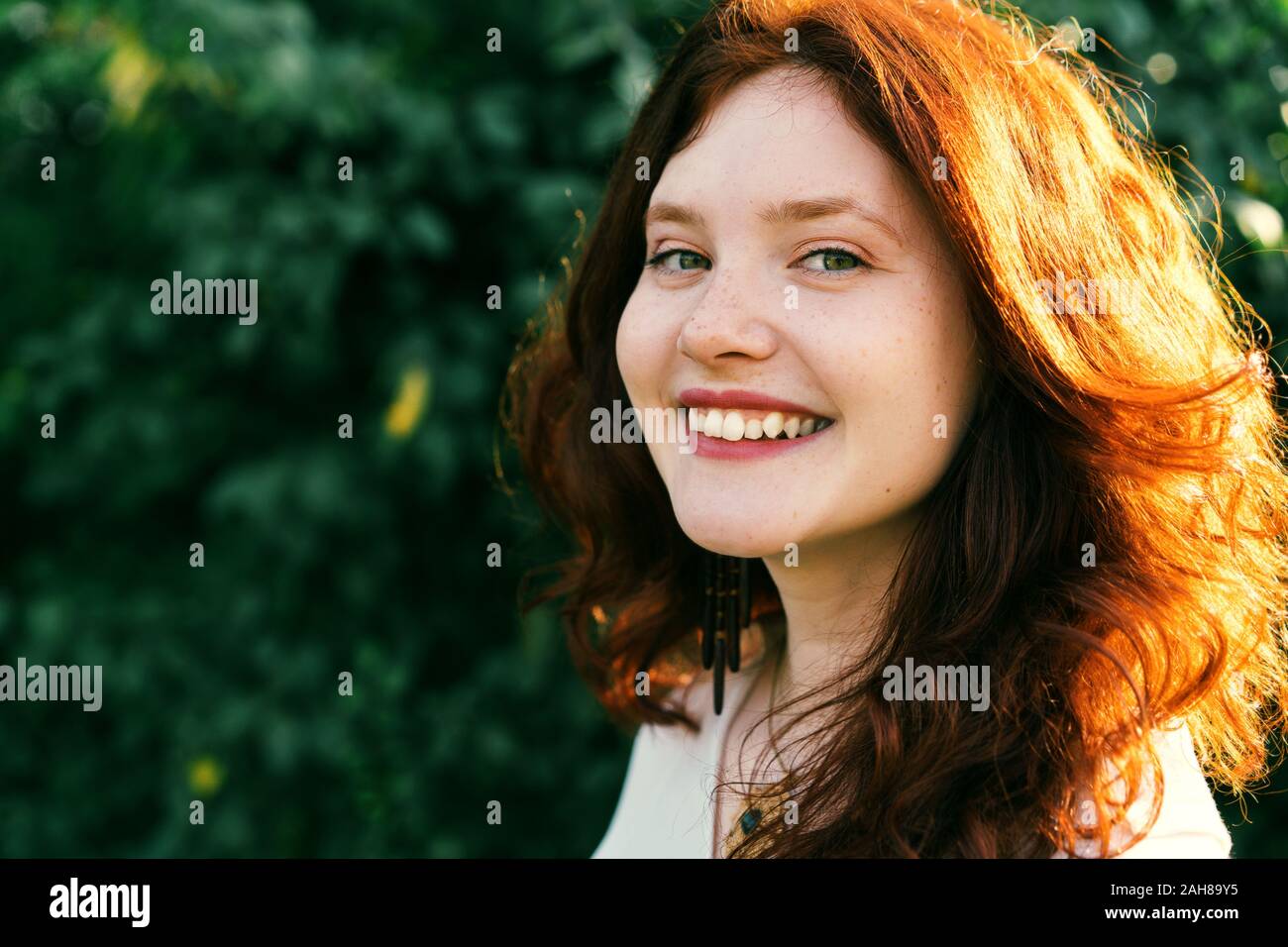 Girl curly hair and freckles hi-res stock photography and images - Alamy