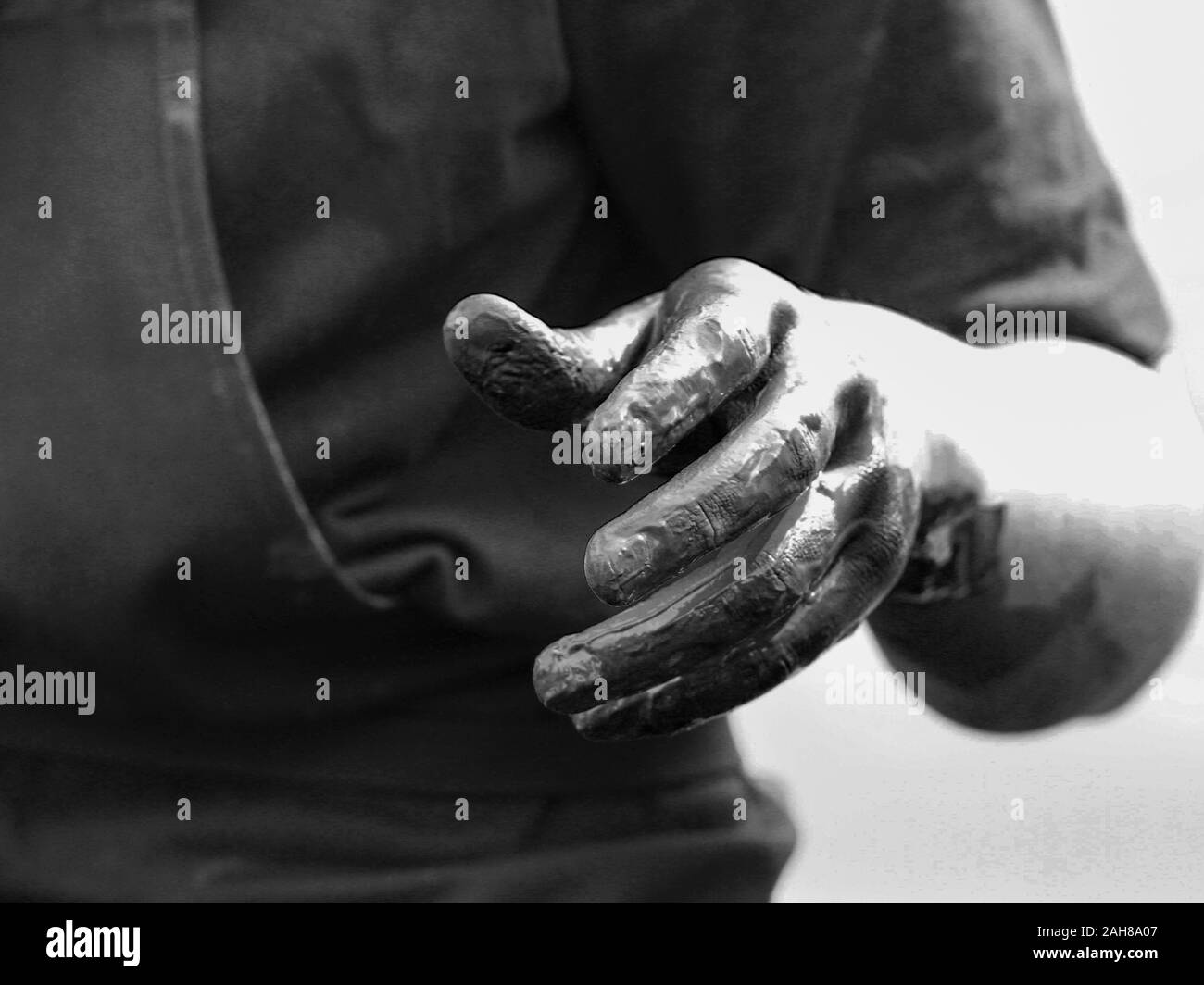 Craftsman hand making pottery Black and White Stock Photos & Images - Alamy
