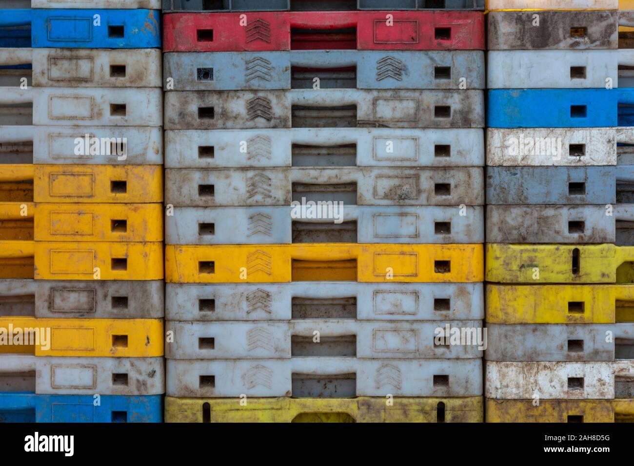 stacks or piles of packaging or storage crates made from plastic multi ...