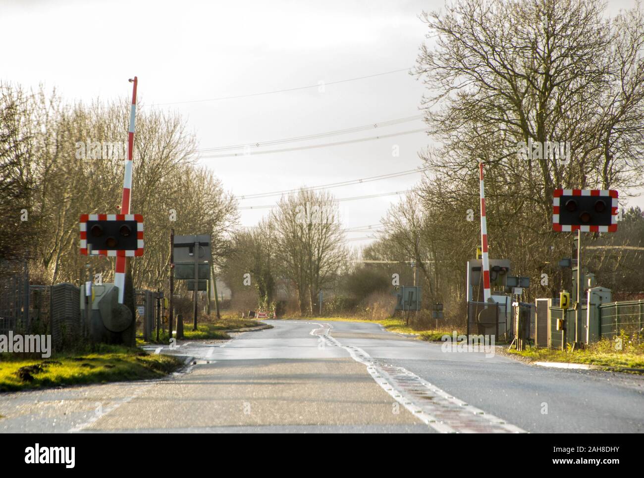 Open level crossing barriers hi-res stock photography and images - Alamy