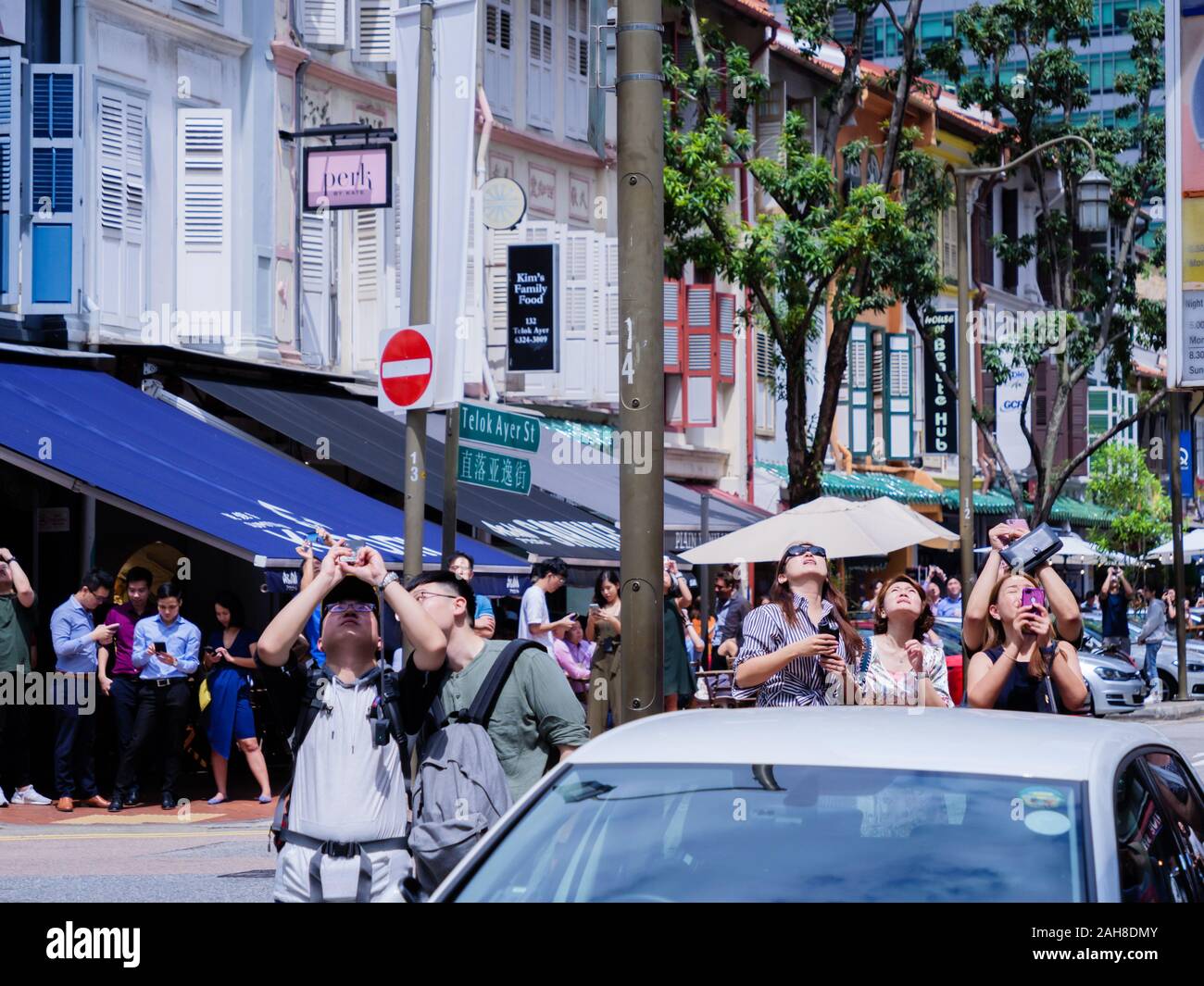 SINGAPORE – 26 DEC 2019 – Crowd of onlookers in the Central Business ...
