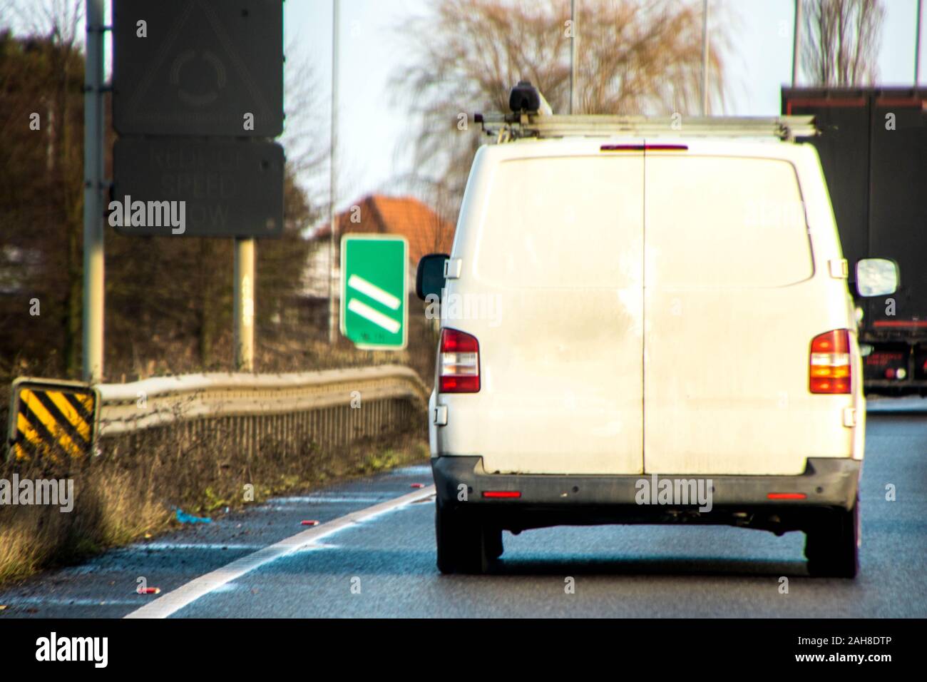A white van used by thousands of businesses to carry goods, tools and ...