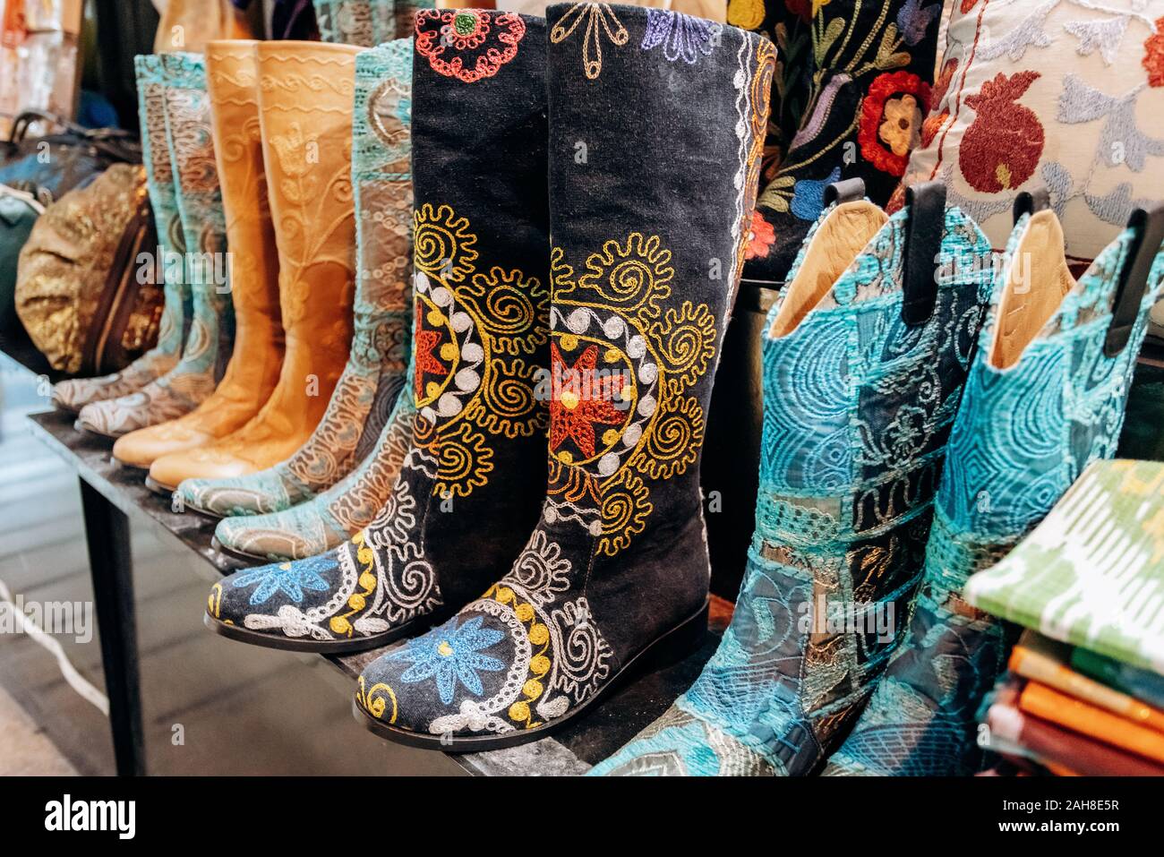 Beautiful Oriental boots on the store counter Stock Photo - Alamy