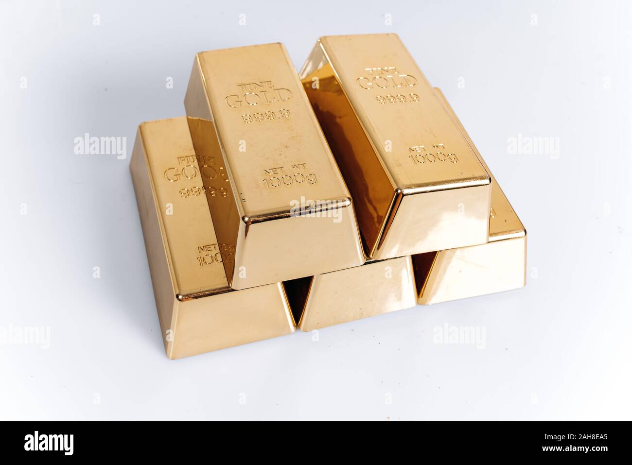 Gold bars of 1 kg or 1000 grams. Gold bars are on the table Stock Photo ...