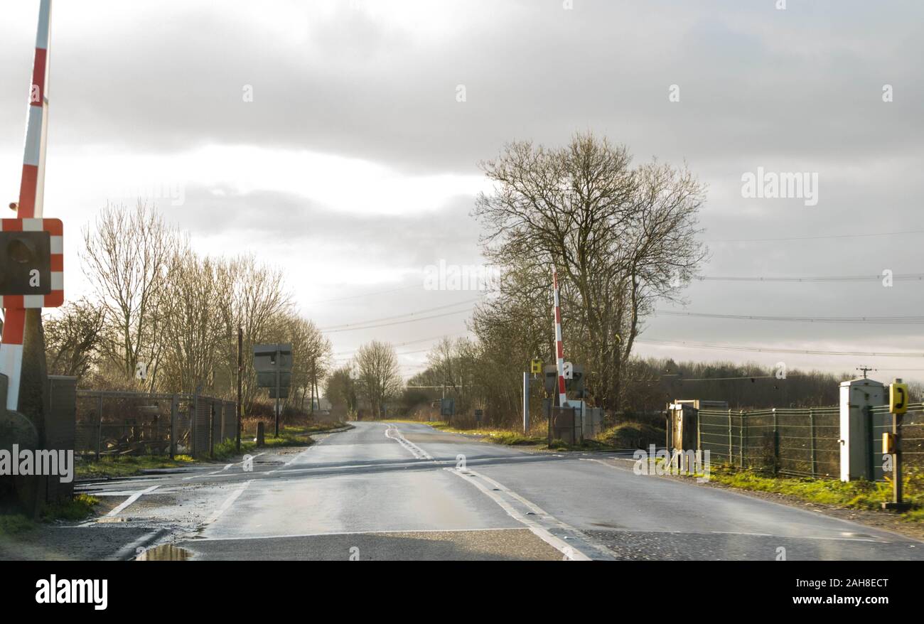 Open level crossing barriers hi-res stock photography and images - Alamy