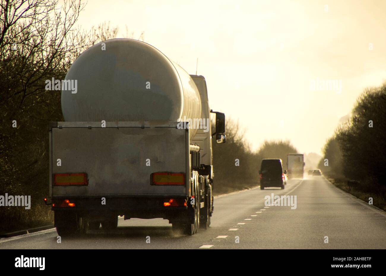A large HGV travels across country to deliver or collect goods for the ...