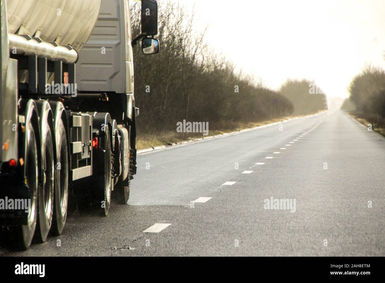 A large HGV travels across country to deliver or collect goods for the ...