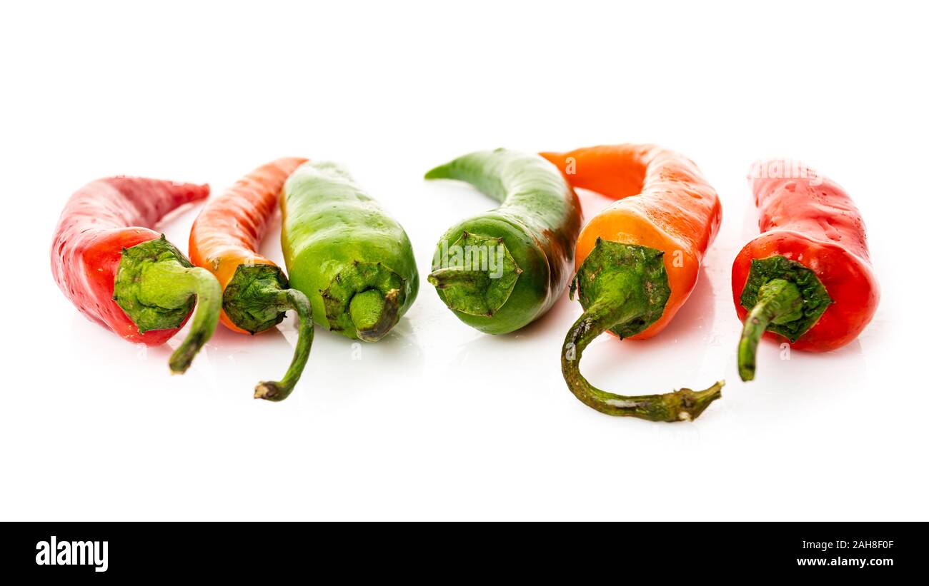 Red, green chilli peppers isolated on a white background Stock Photo ...