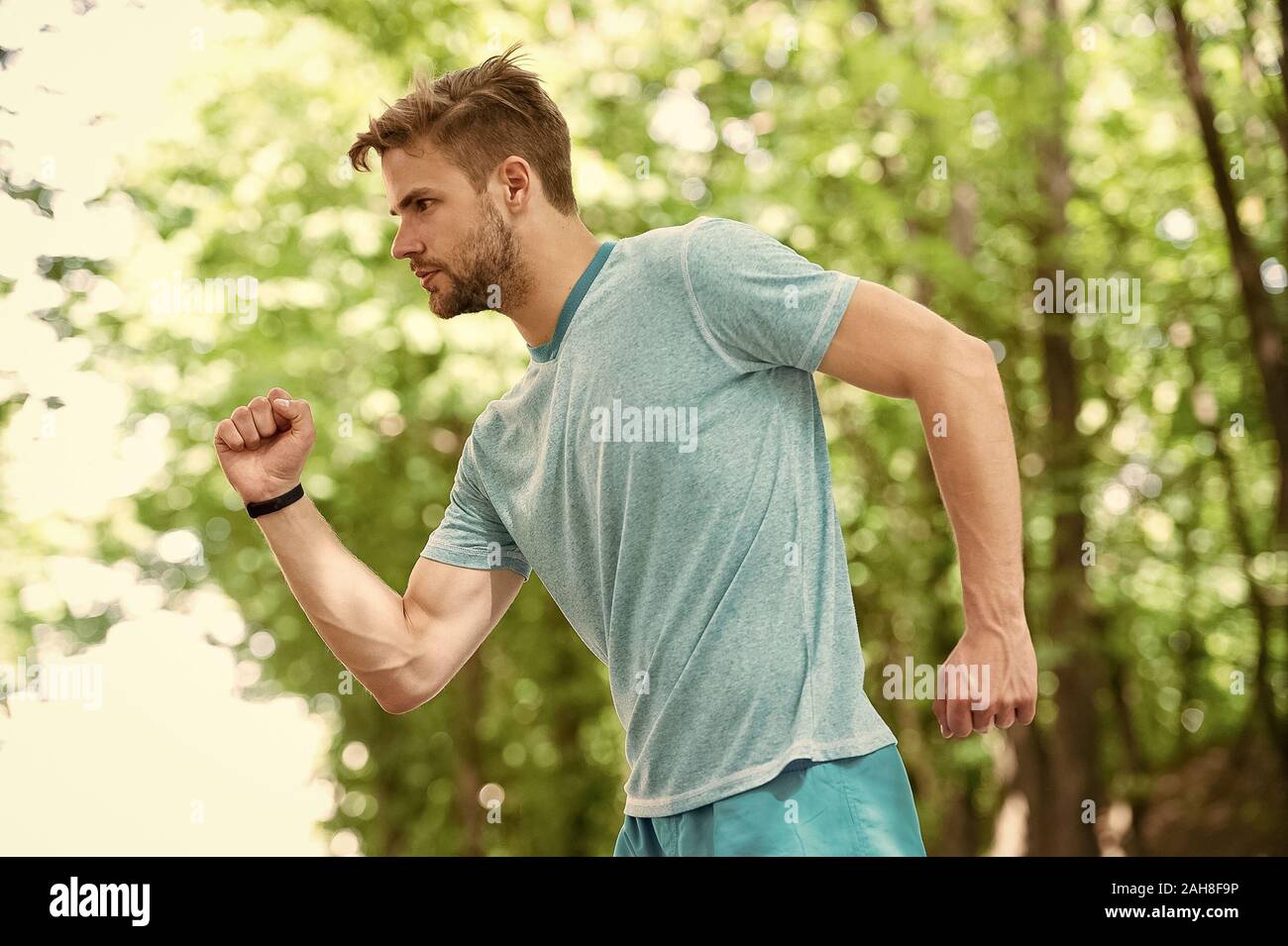 Sport is way of life. Sportsman lifestyle. Handsome athlete in park ...