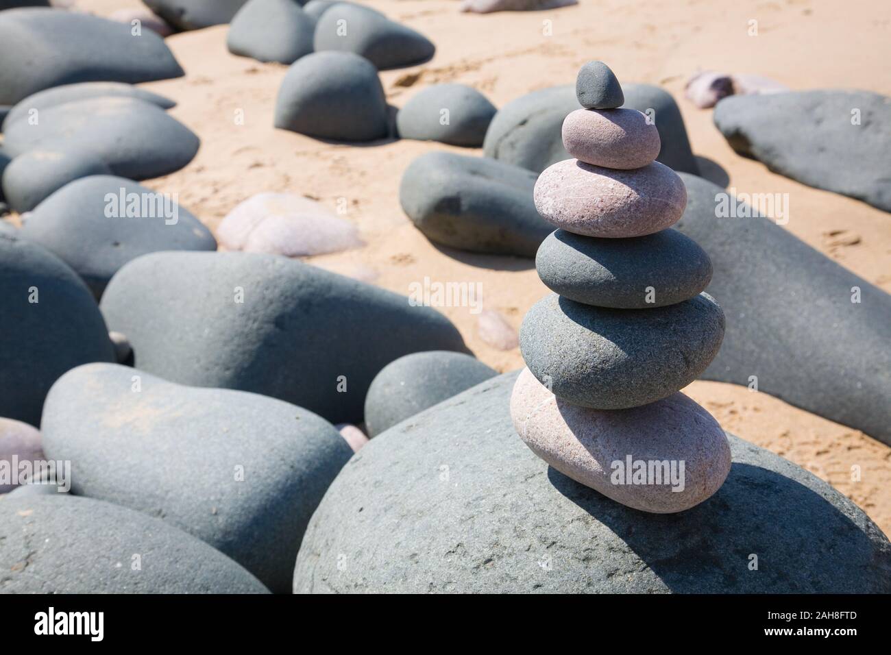 Pebble tower on the beach in Brittany Stock Photo - Alamy