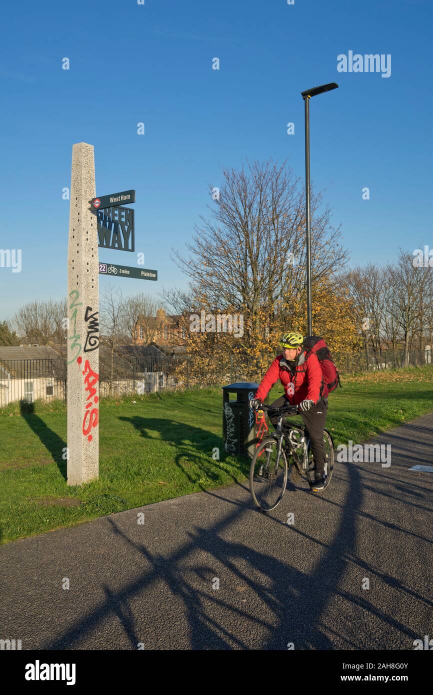 Cyclist by Greenway path near Stratford by Queen Elizabeth II Olympic ...