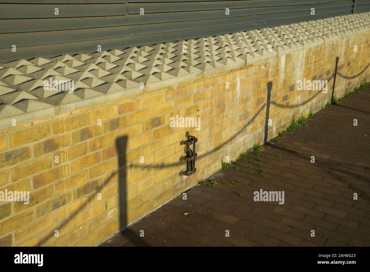 Anti-homeless spikes and rough surfaces installed in a luxury housing ...