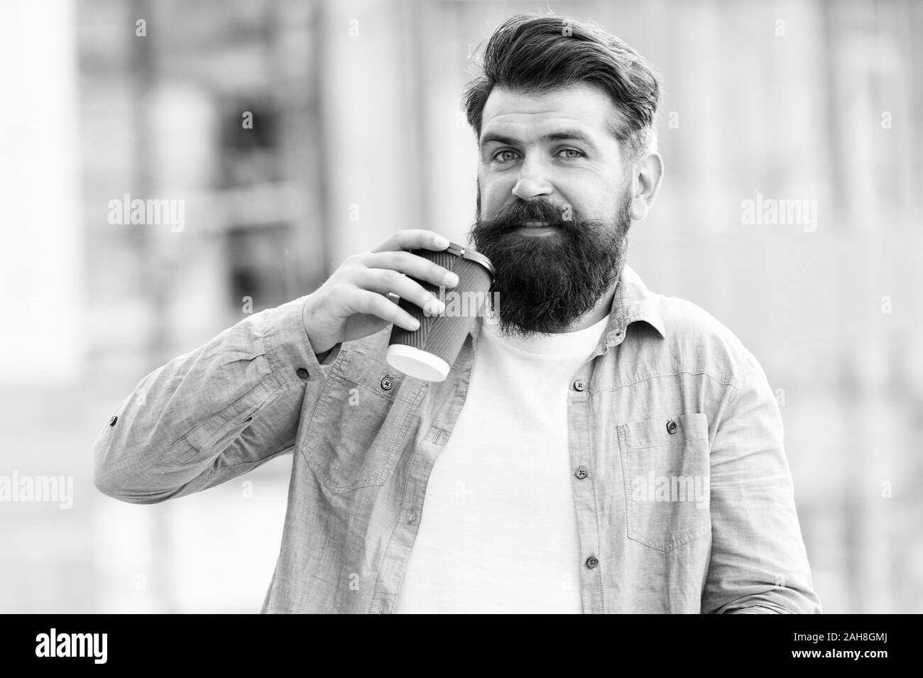 Bearded man drinking hot tea Black and White Stock Photos & Images - Alamy