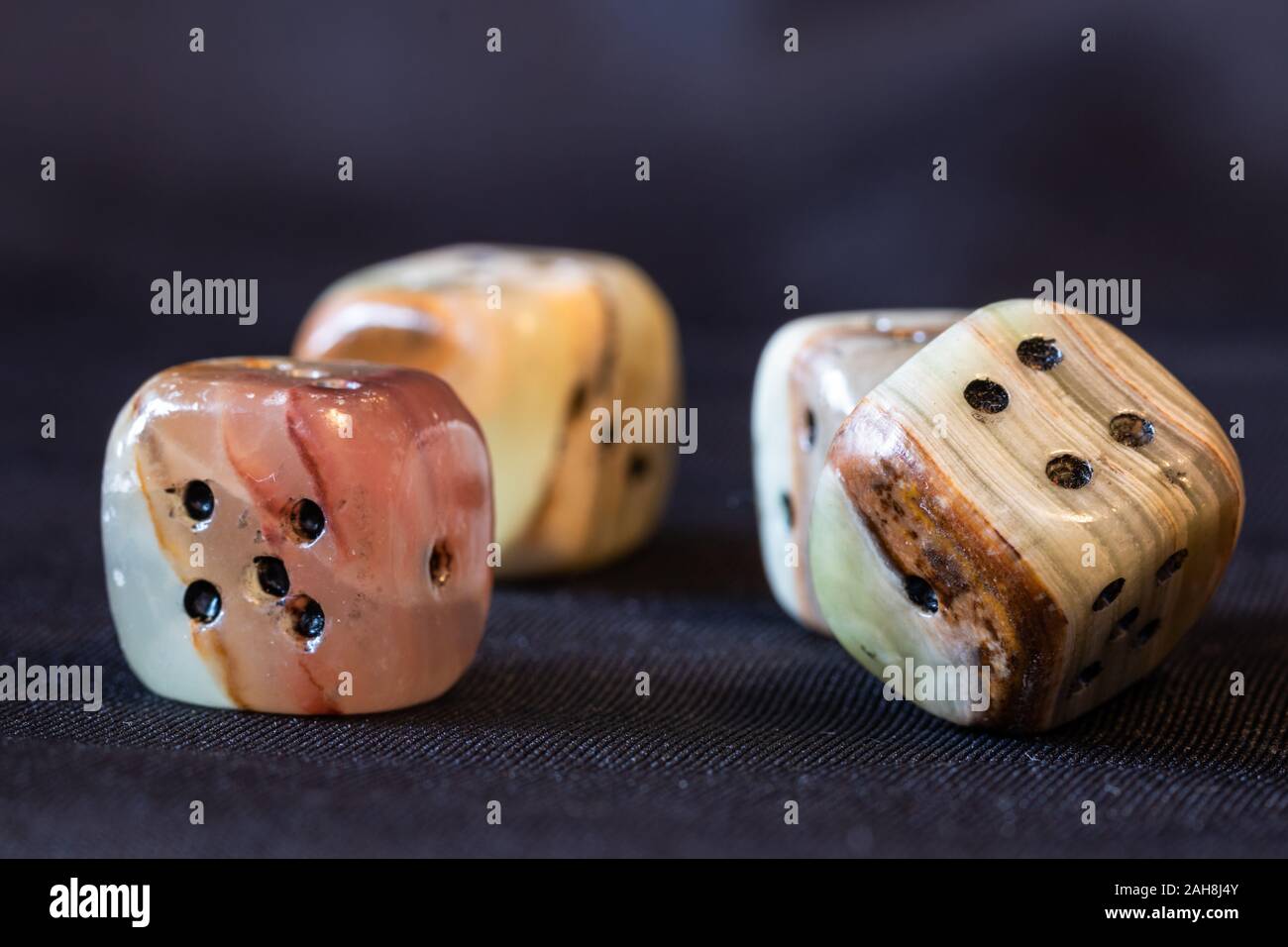 Dice and stone hi-res stock photography and images - Alamy