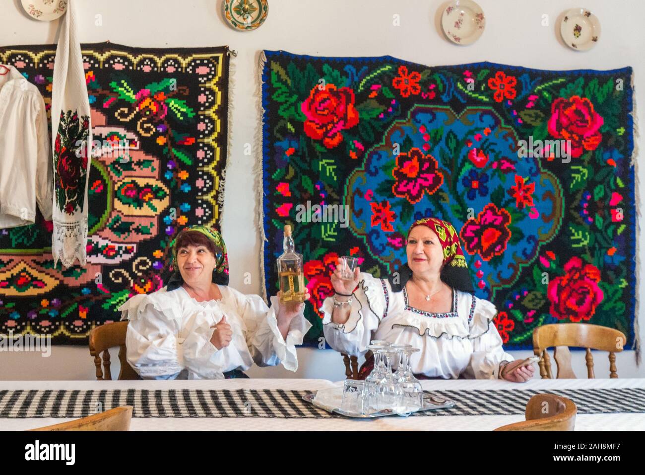 Barsana, Romania - July 01 2018: Local people dressed in traditional ...