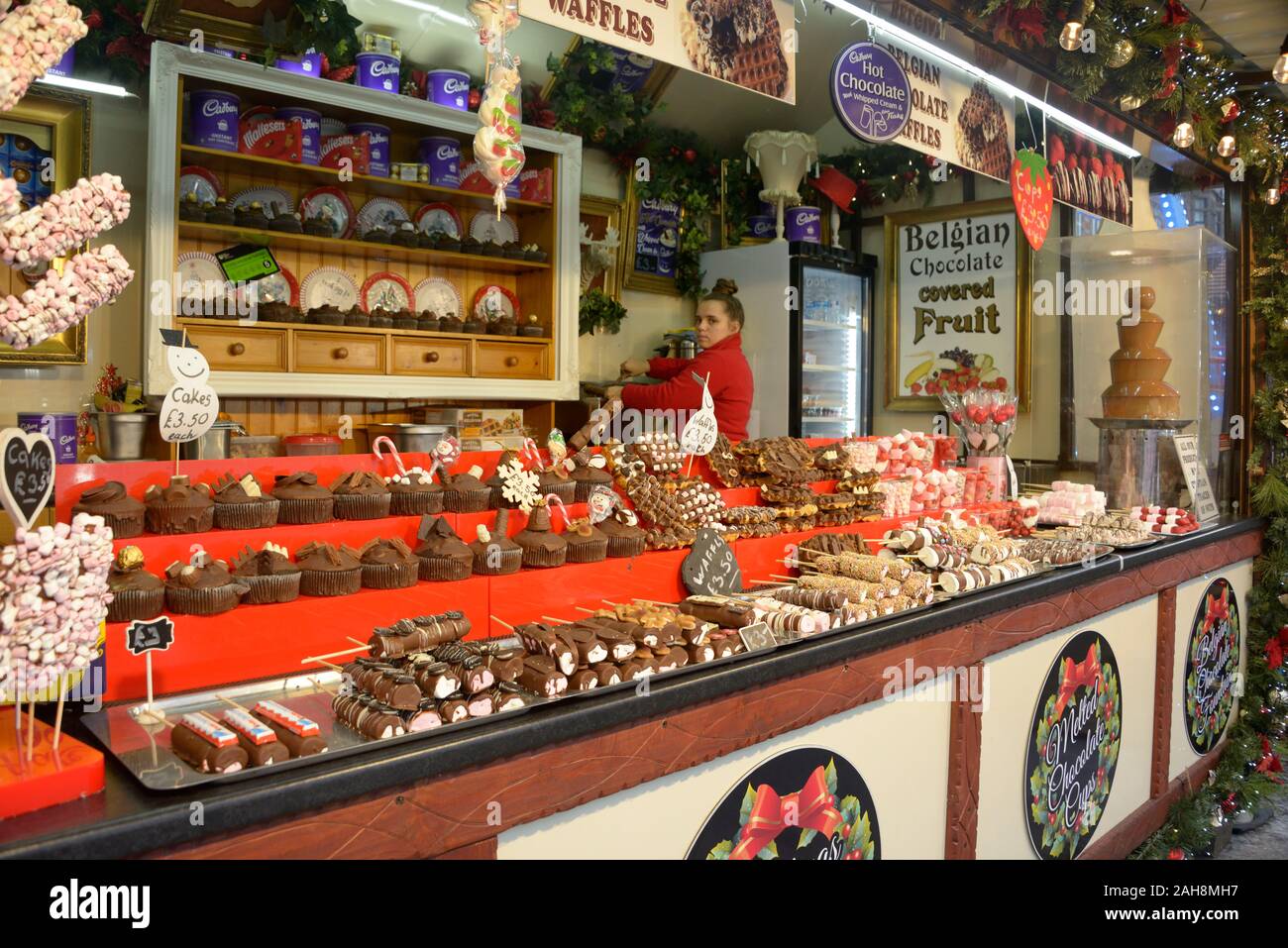 Lady behind counter, at the Chocolate stall, at Winter Wonderland ...