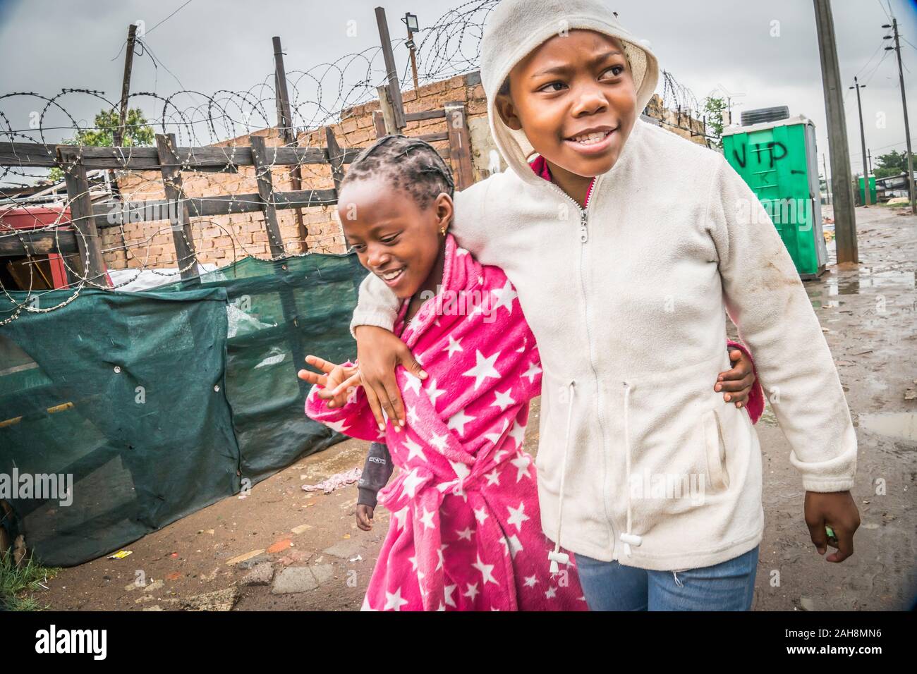 Johannesburg, South Africa - December 4, 2019 - girls walk down the ...