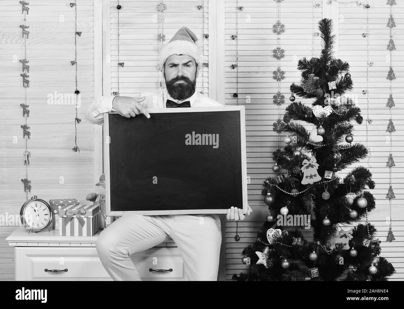 Confused man christmas Black and White Stock Photos & Images - Alamy
