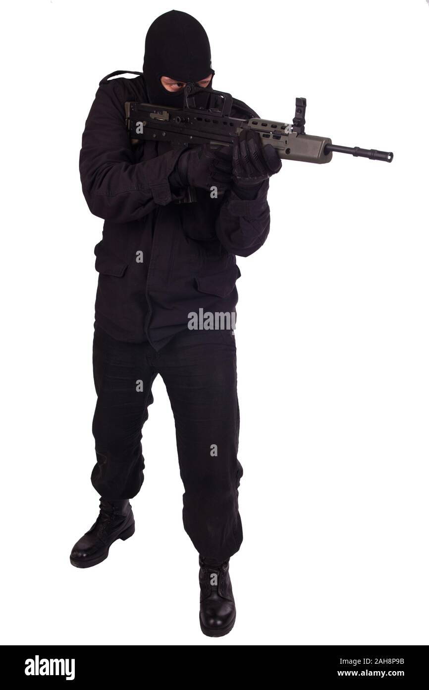 man in black uniform and mask with assault rifle isolated on white ...