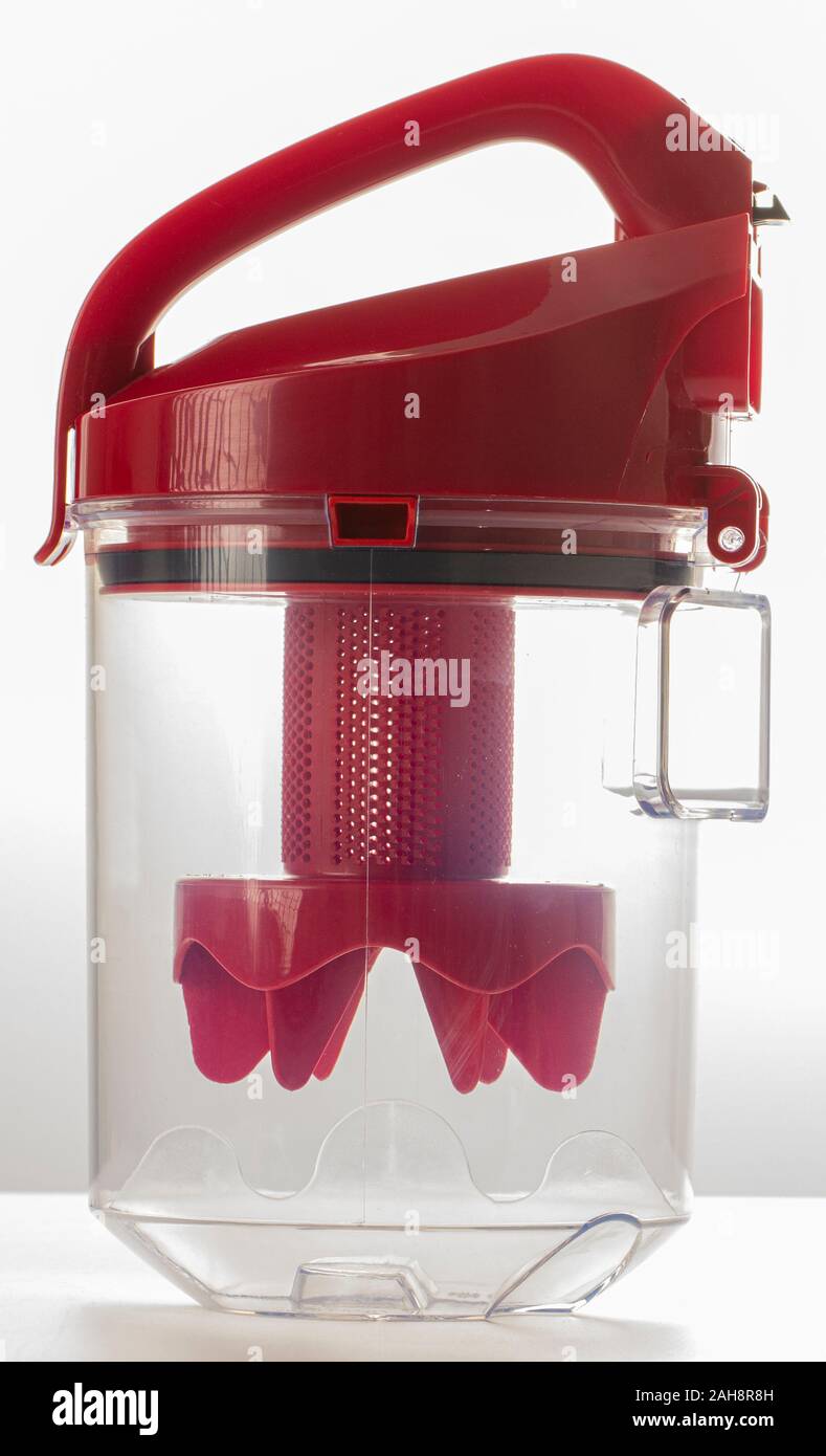 red transparent dustbin for vacuum cleaner on a white background Stock ...
