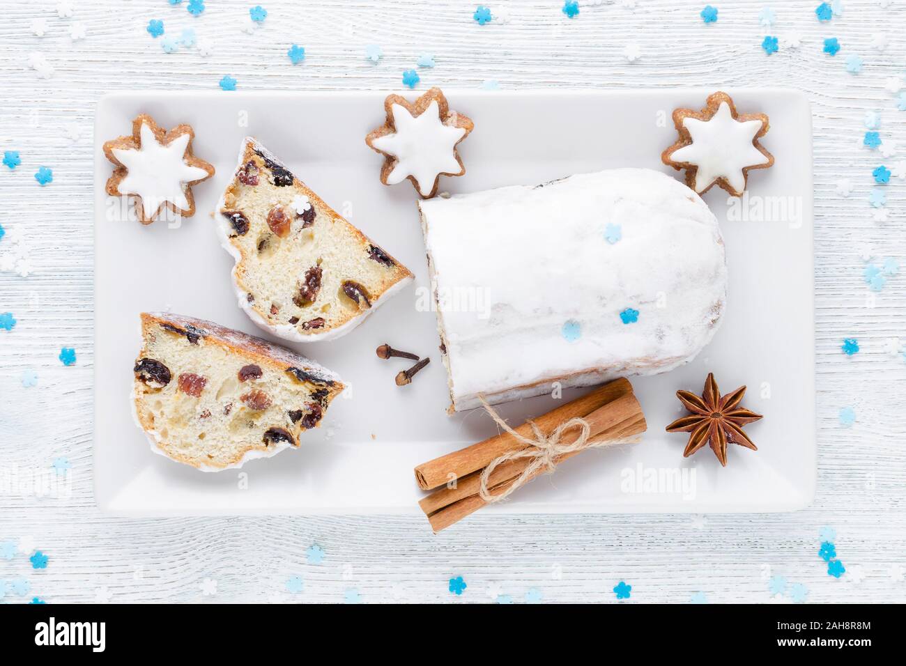 traditional german christmas cake stollen with cookies and decoration ...