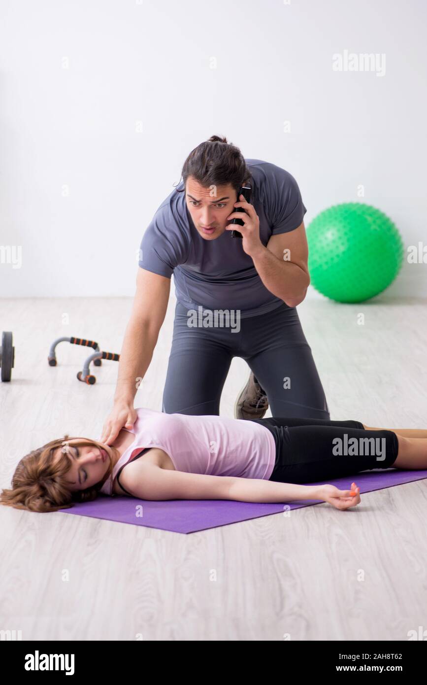 The young woman feeling bad during training in first aid concept Stock ...