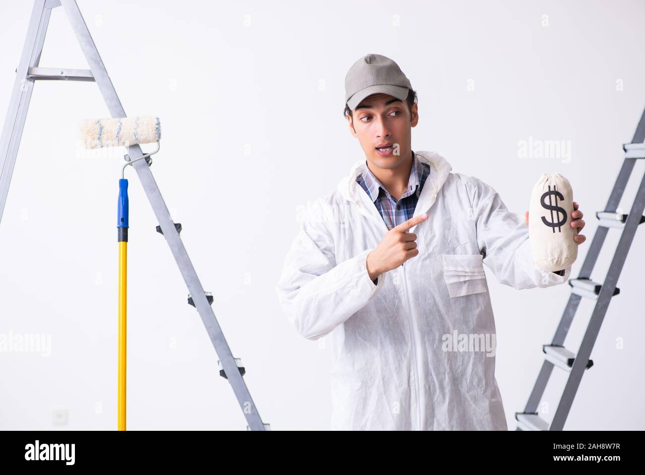 Painter working at the construction site Stock Photo - Alamy