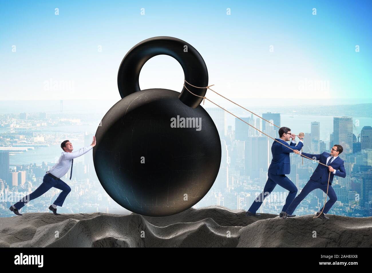 The businessmen trying to deal with difficult task Stock Photo - Alamy