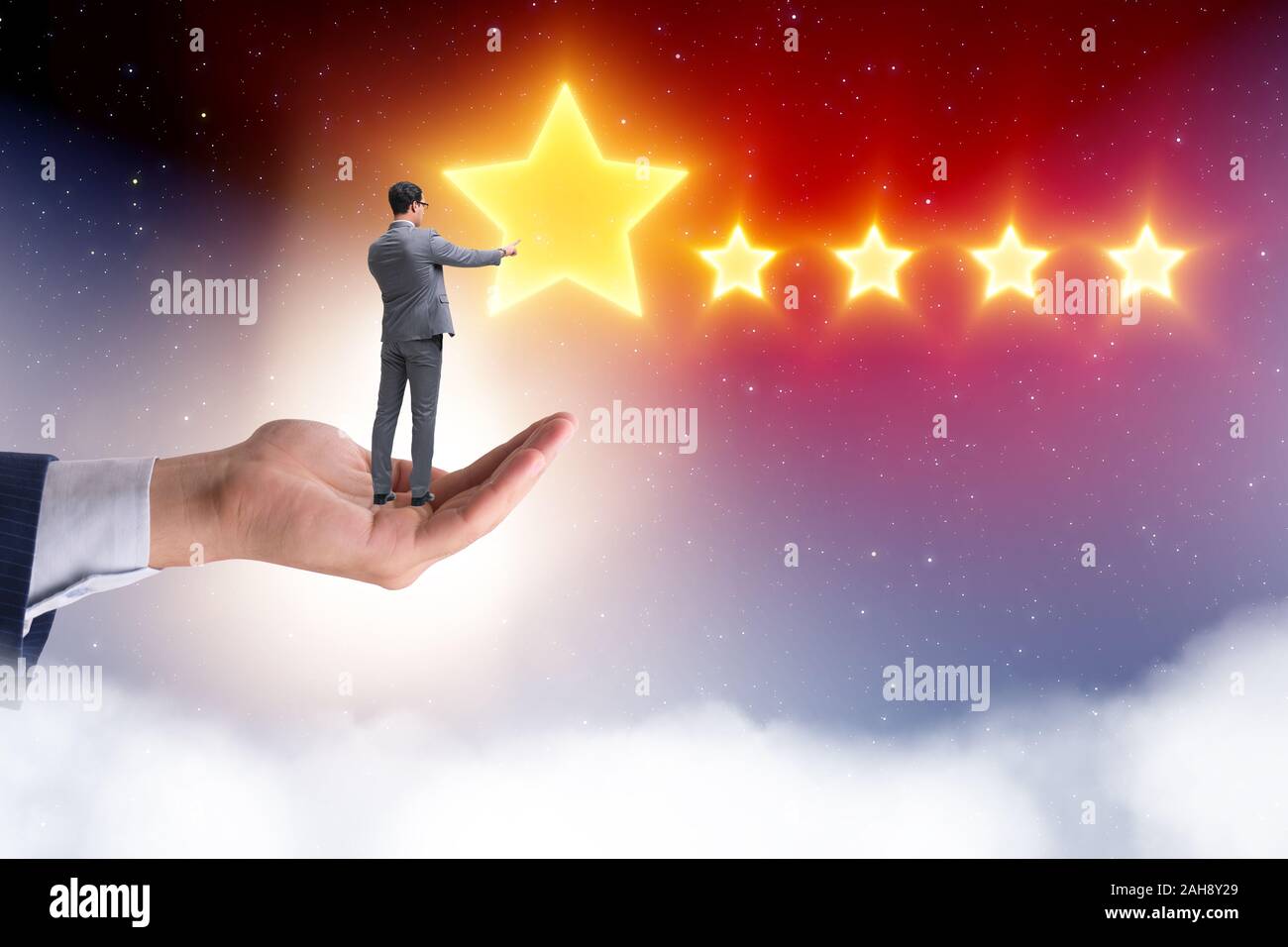 The businessman held on hand reaching out for stars Stock Photo - Alamy