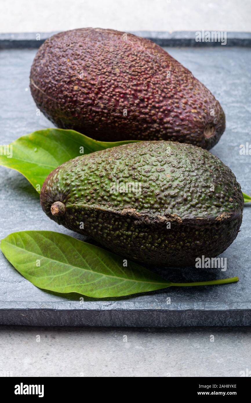 New harvest of fresh ripe hass avocado close up Stock Photo - Alamy