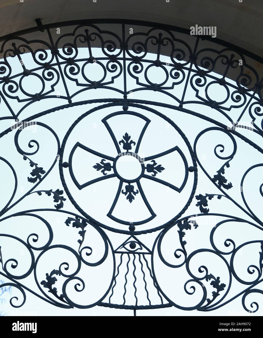 Metal forged cross with an all-seeing eye - a symbol of masons Stock ...