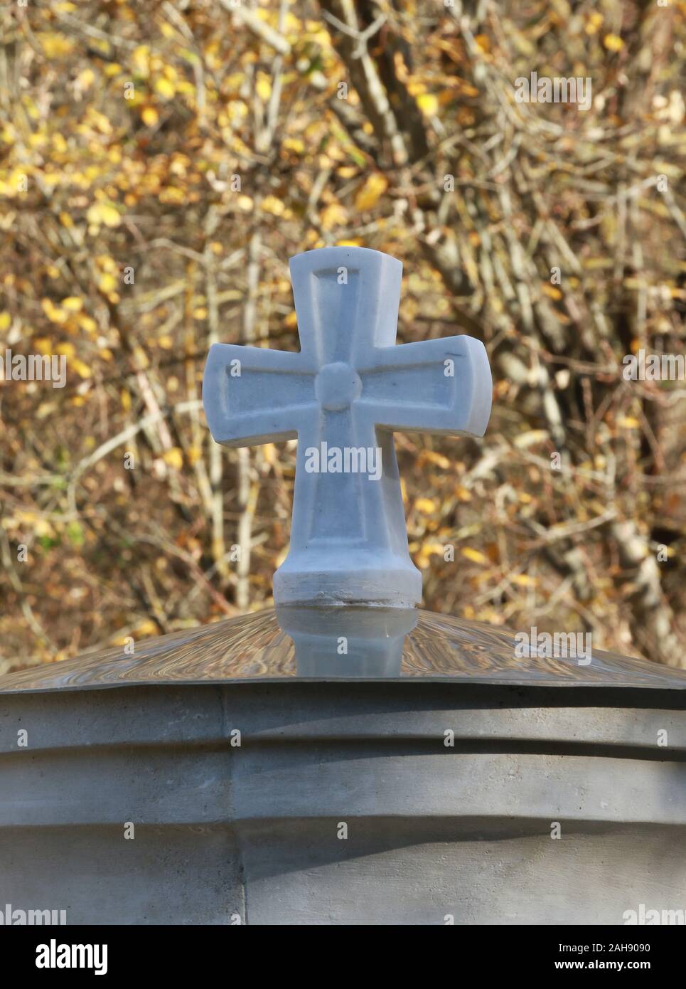 marble cross on a column Stock Photo - Alamy