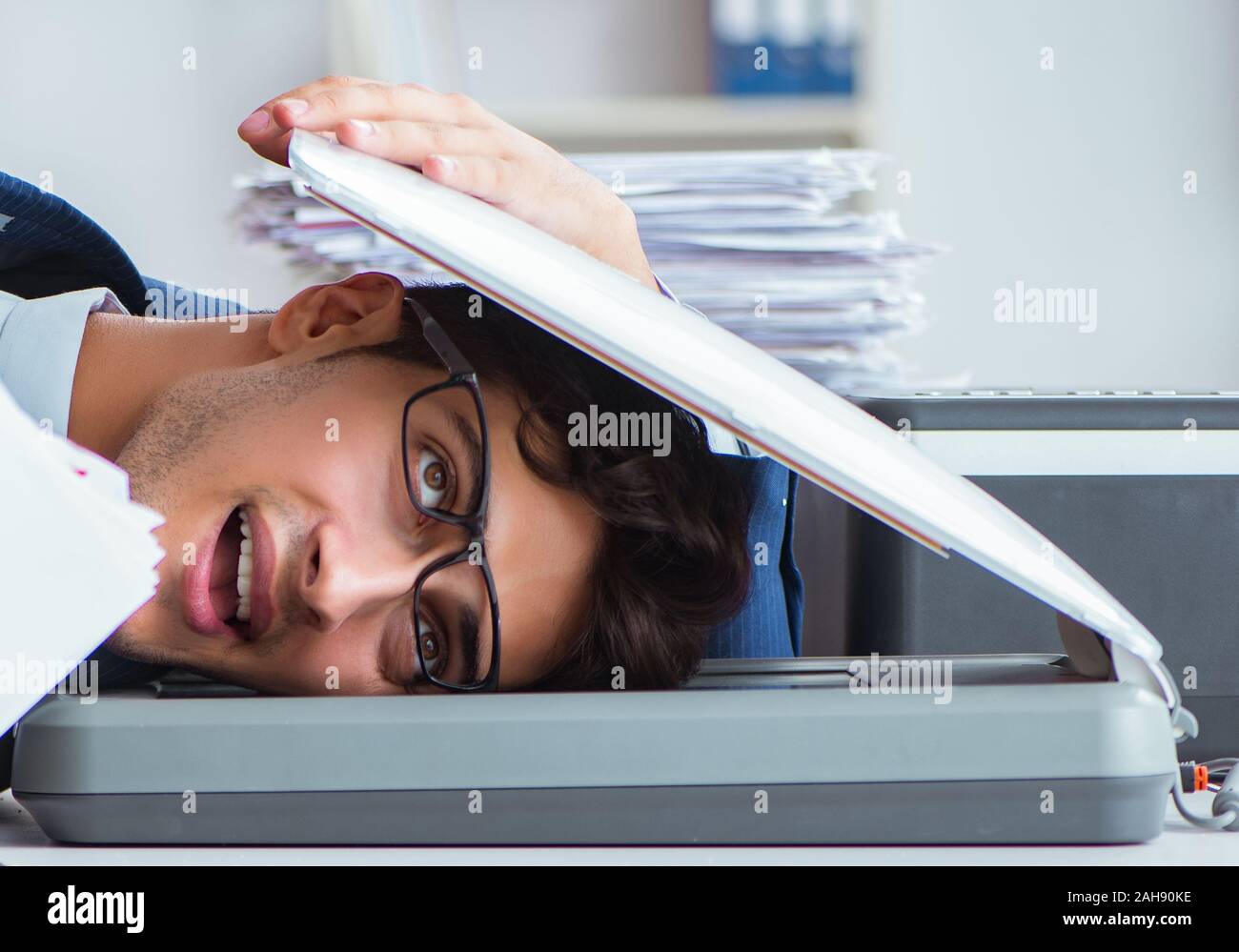 The businessman making copies in copying machine Stock Photo - Alamy