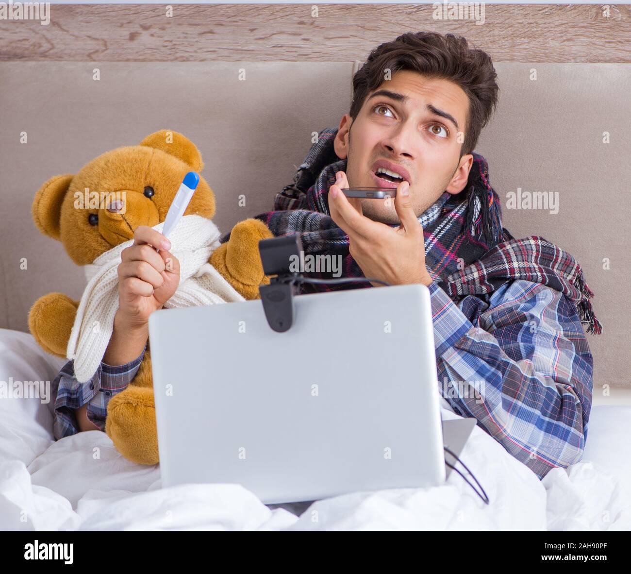 The sick man suffering from flu in the bed Stock Photo - Alamy