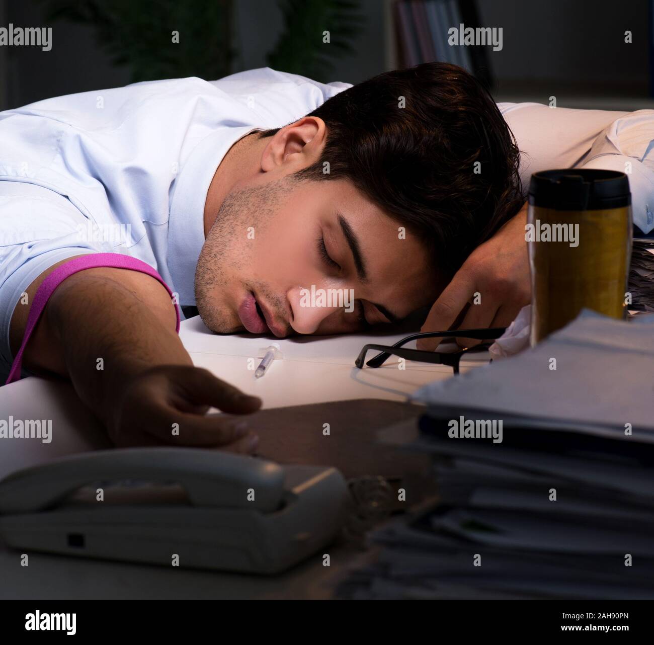 The employee relieving stress from overtime with drugs narcotics Stock ...