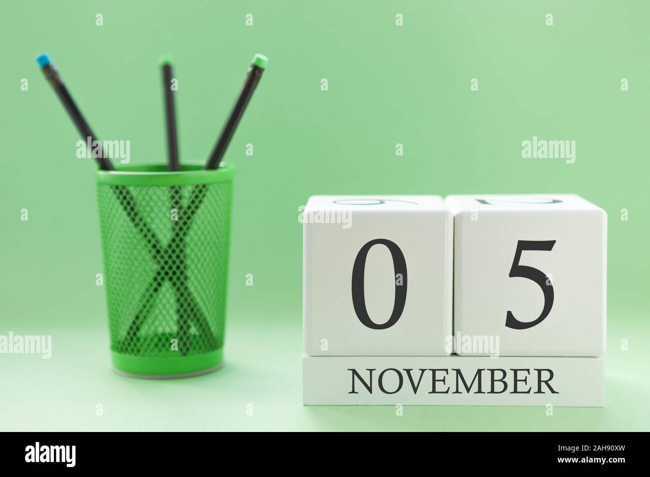 Desk calendar of two cubes for November 5 Stock Photo - Alamy