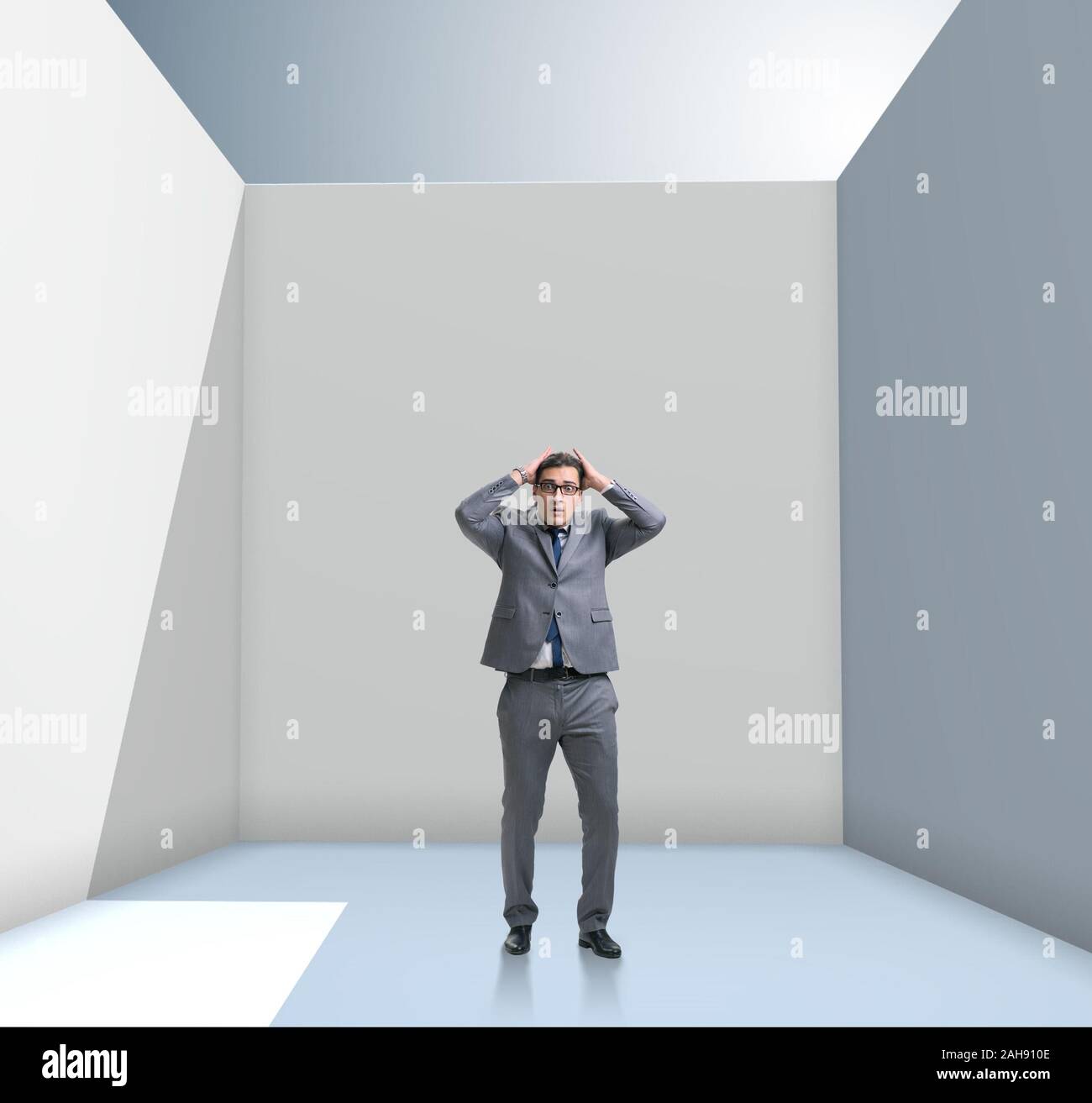 The businessman trying to escape from difficult situation Stock Photo ...
