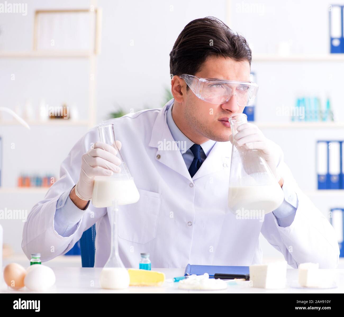 Student testing food in lab hi-res stock photography and images - Alamy