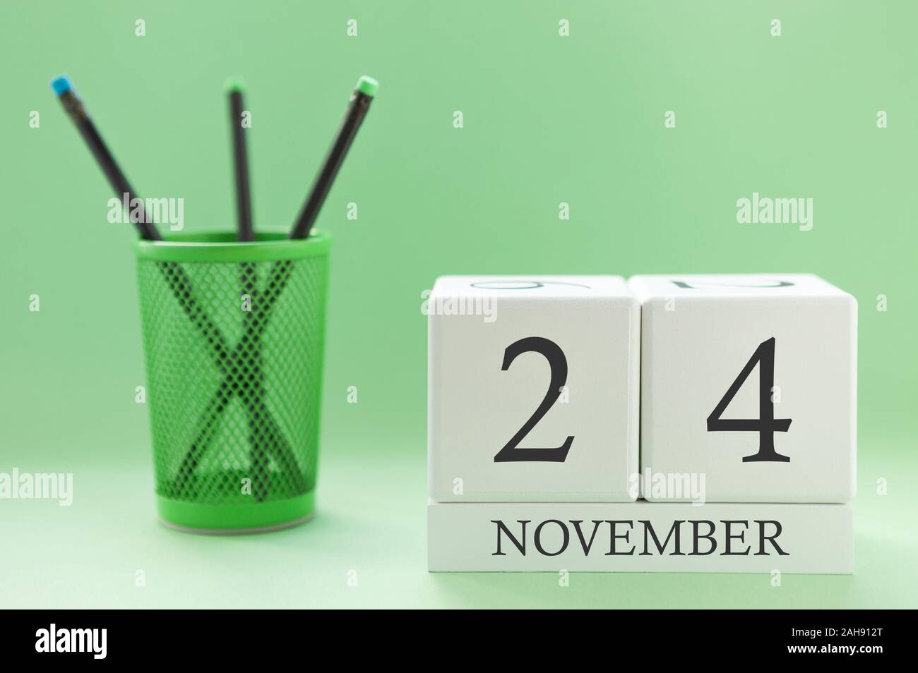 Desk calendar of two cubes for November 24 Stock Photo - Alamy