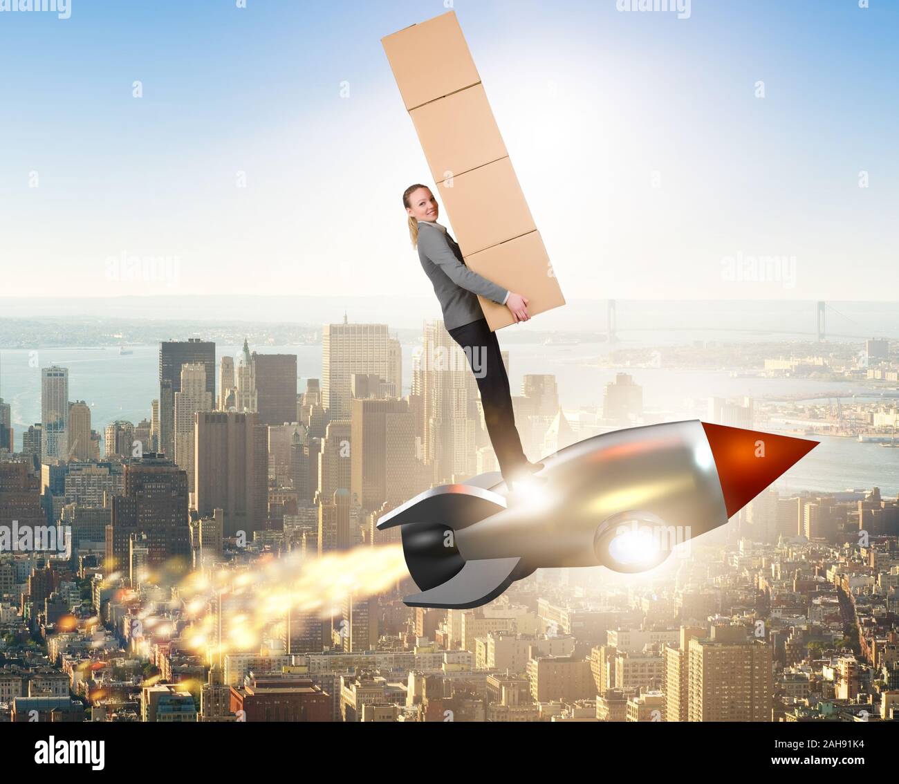 The woman flying rocket and delivering boxes Stock Photo - Alamy