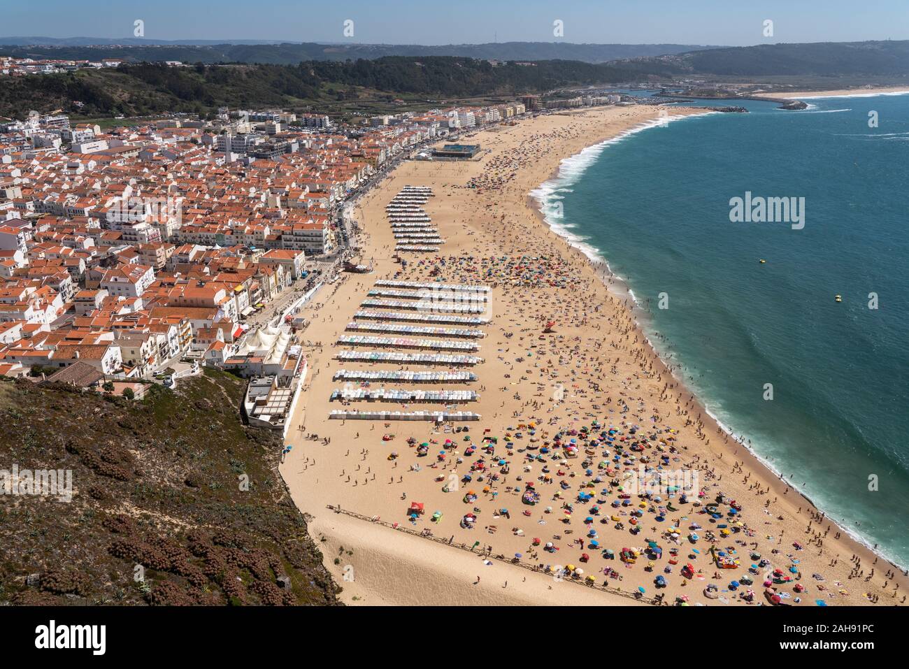 Nazare, Portugal - 20 August 2019: Crowded beach of Nazare from above ...