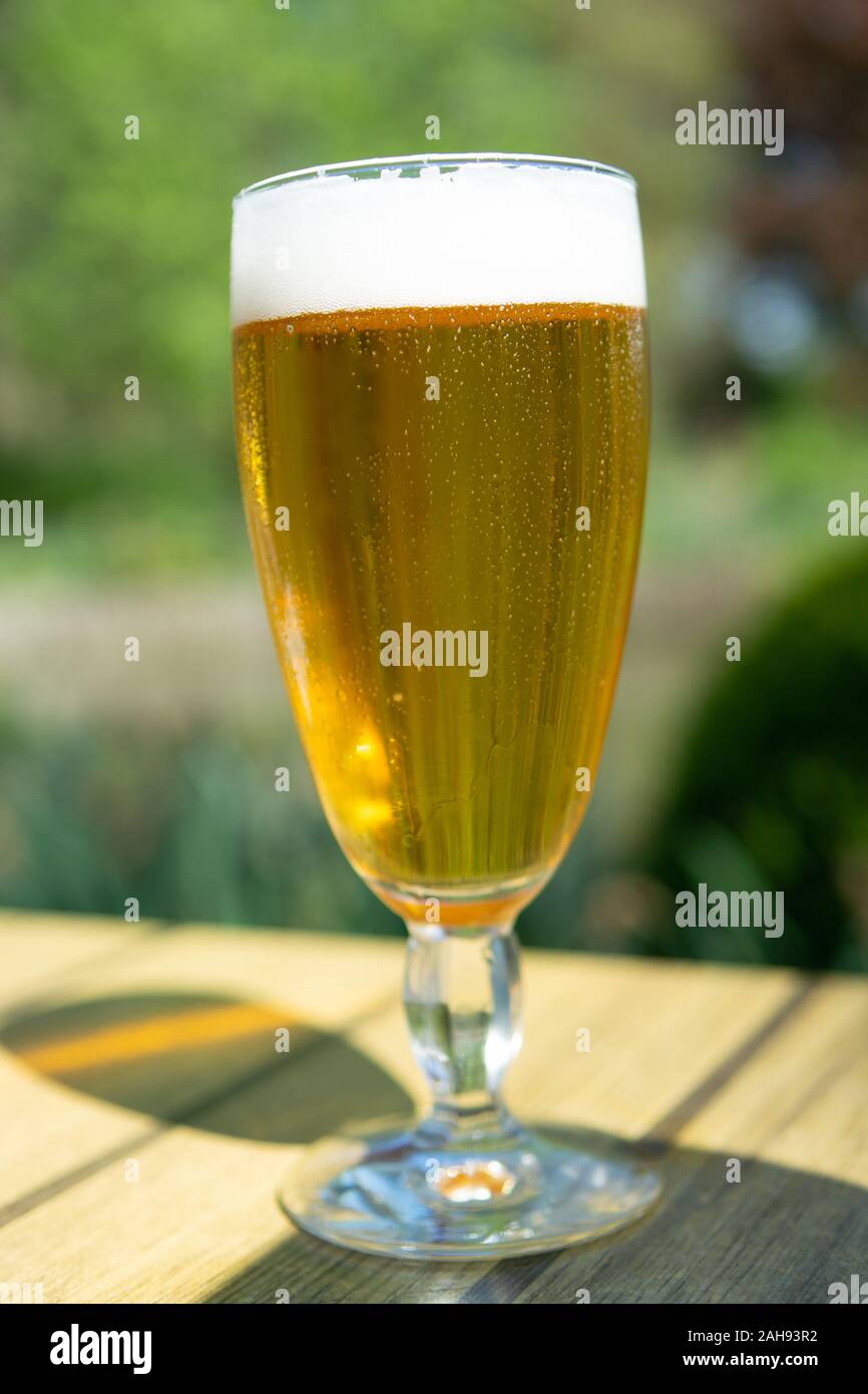 Cold beer served outside in hi-res stock photography and images - Alamy