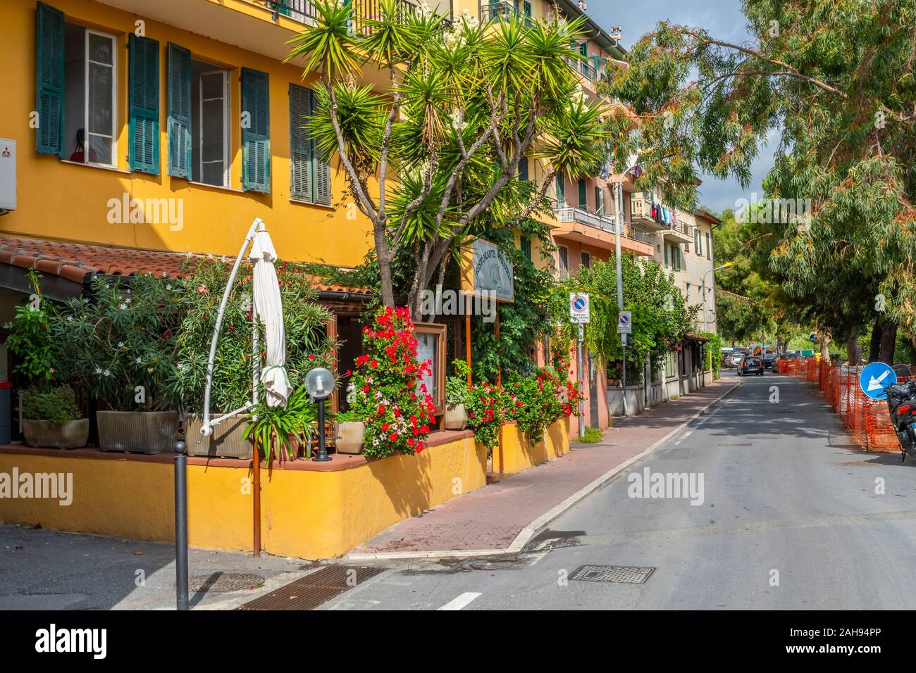 A colorful restaurant with a patio on the outskirts of the Ligurian ...