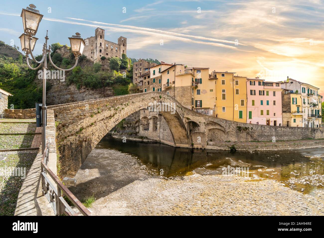 The colorful hilltop, medieval village of Dolceacqua, Italy, with it's ...