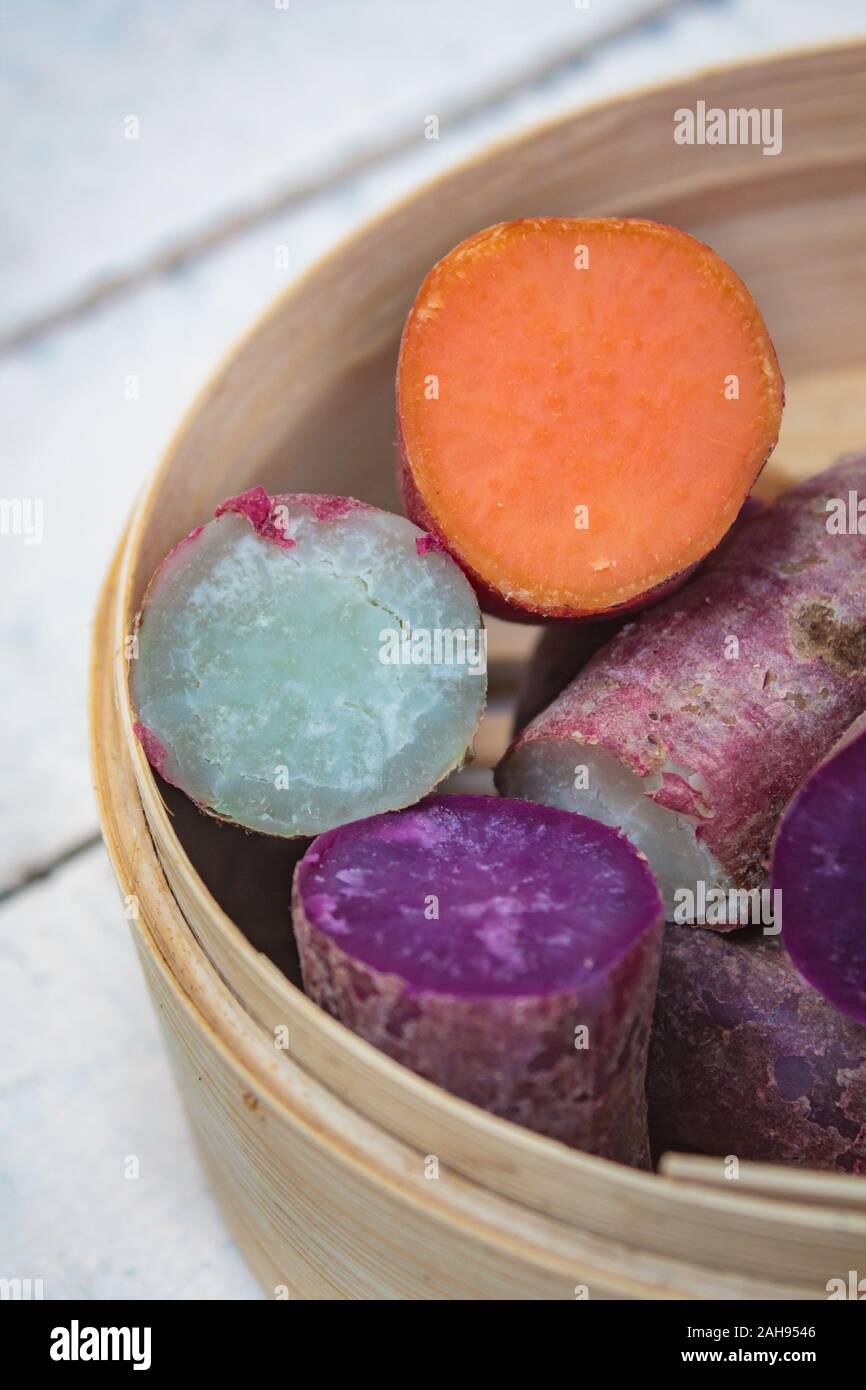 Boiled organic sweet potato, yellow yam, purple yam Stock Photo - Alamy
