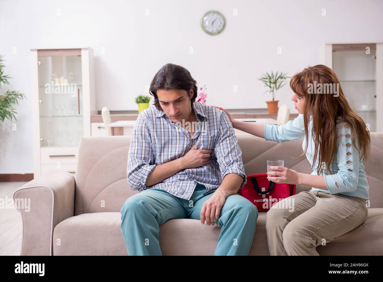 Unconscious woman and sofa hi-res stock photography and images - Alamy