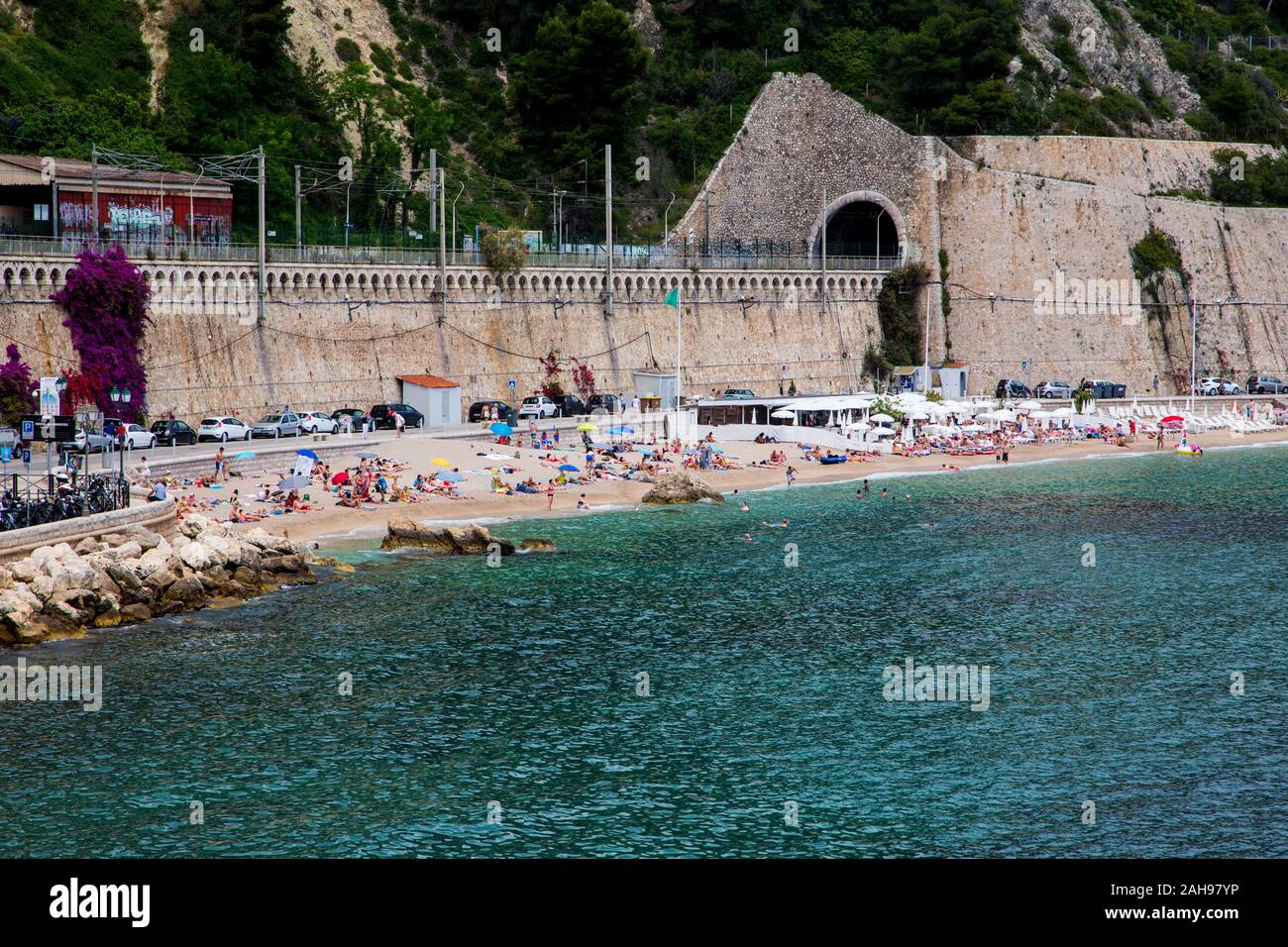 The beach in the French Riviera town of Villefranche sur Mer in France ...