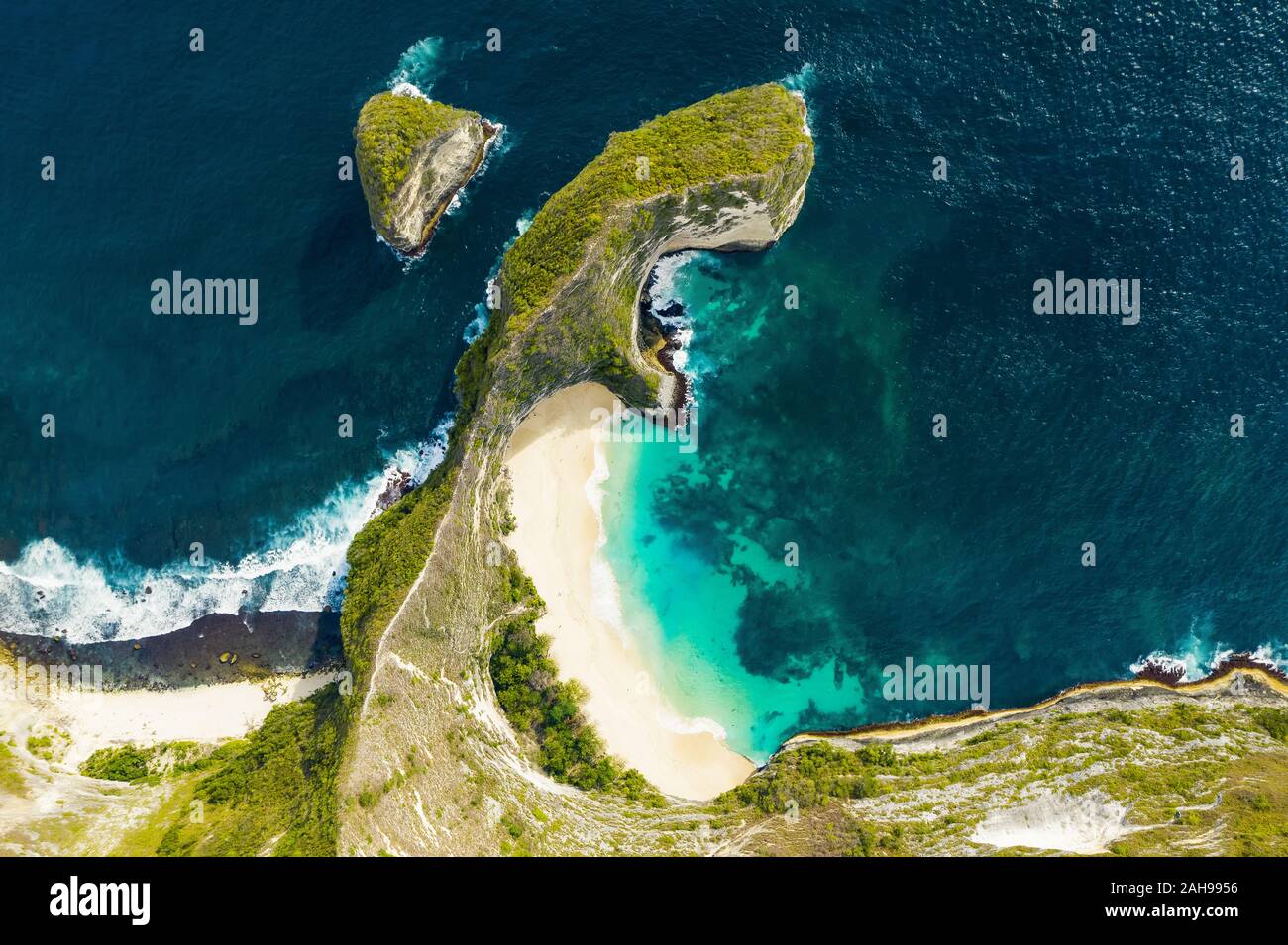 Stunning aerial view of a T-Rex shaped cliffs with the beautiful ...